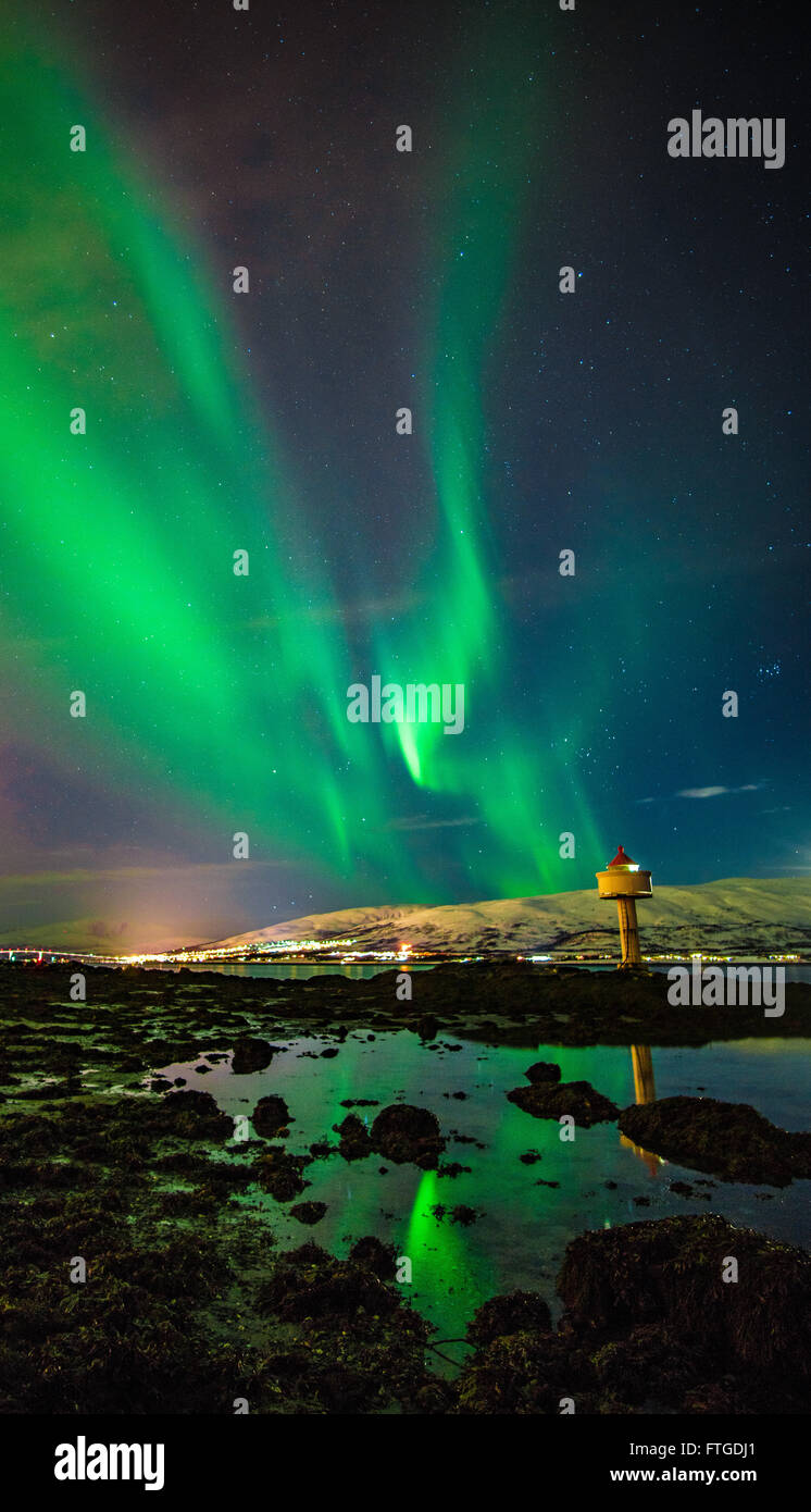 Aurora Borealis dancing over fjord, Tromso Northern Norway Stock Photo ...