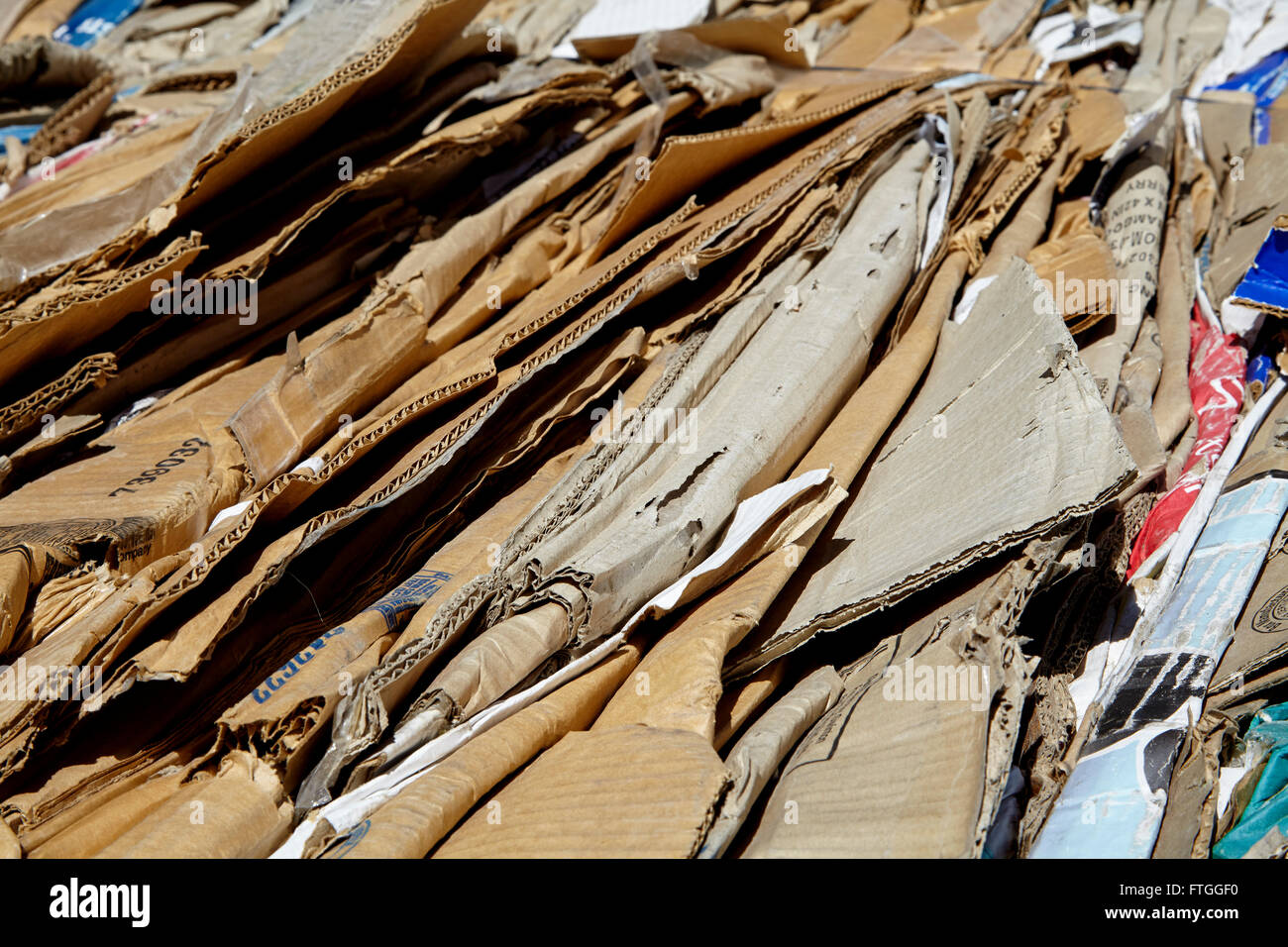 Recycle refuse waste cardboard paper compacted bail Stock Photo - Alamy