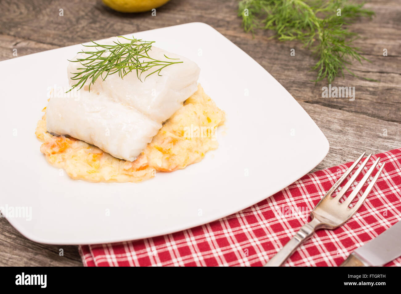 Plate with fish and puree of potatoes and carrots Stock Photo - Alamy