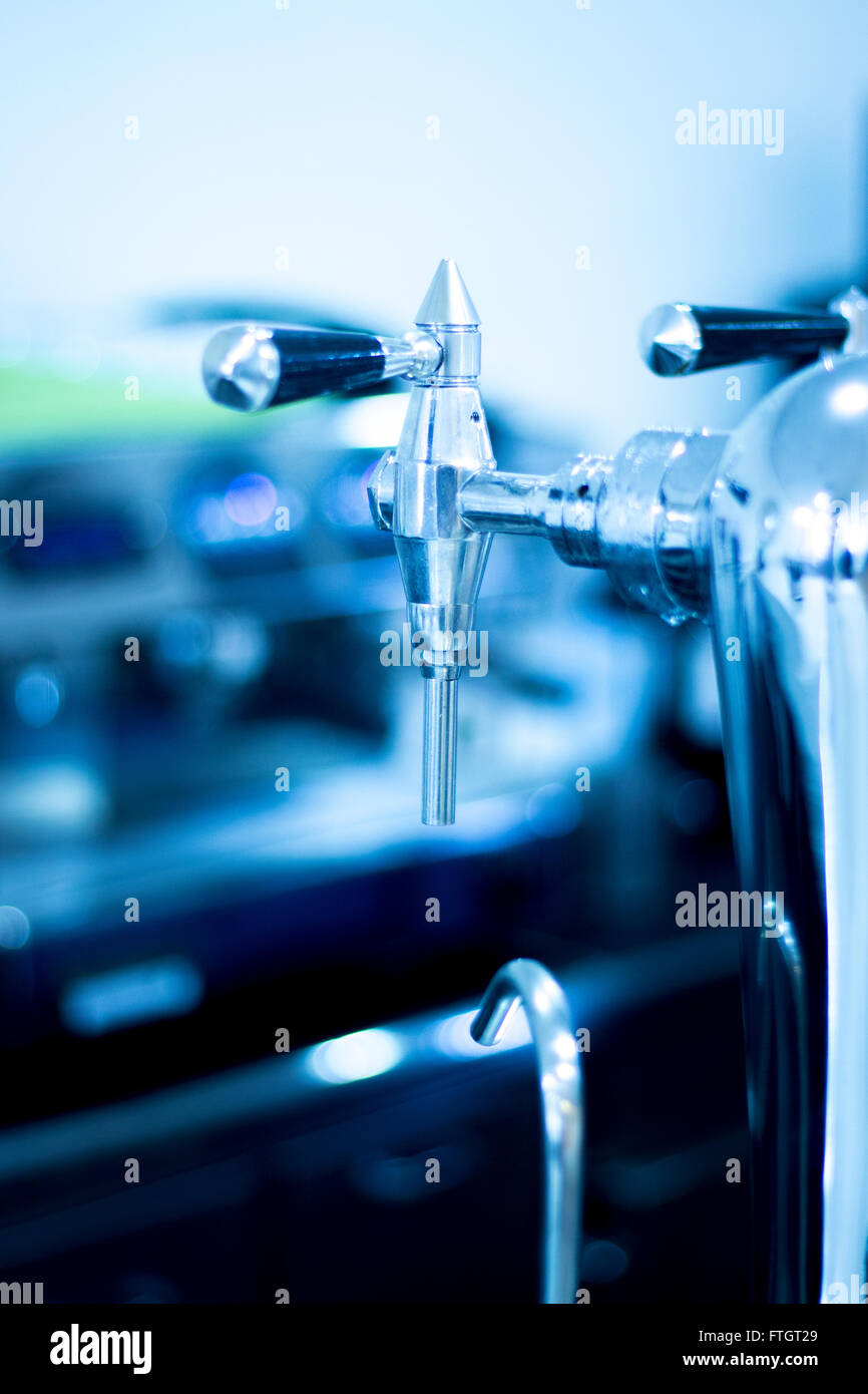 Draught beer pump tap in pub bar photo Stock Photo - Alamy