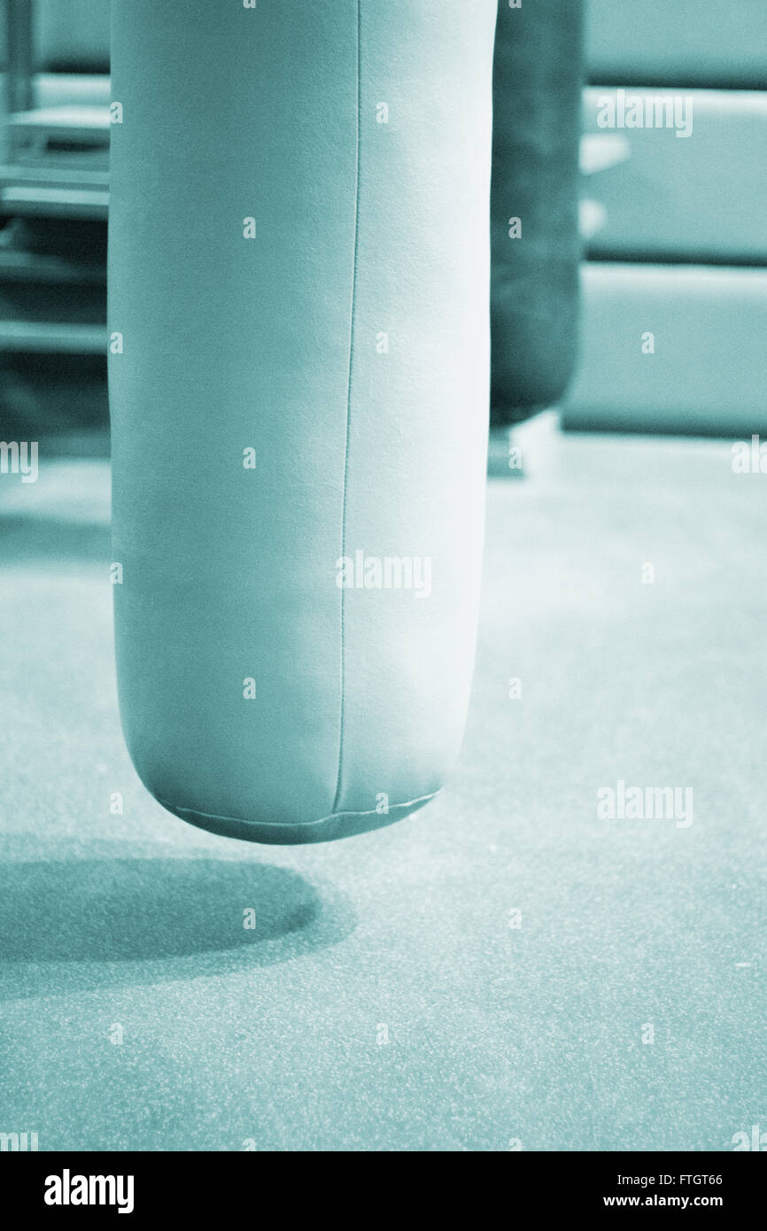 Punch and kick punchbag in boxing, kickboxing, martial arts, MMA and ...