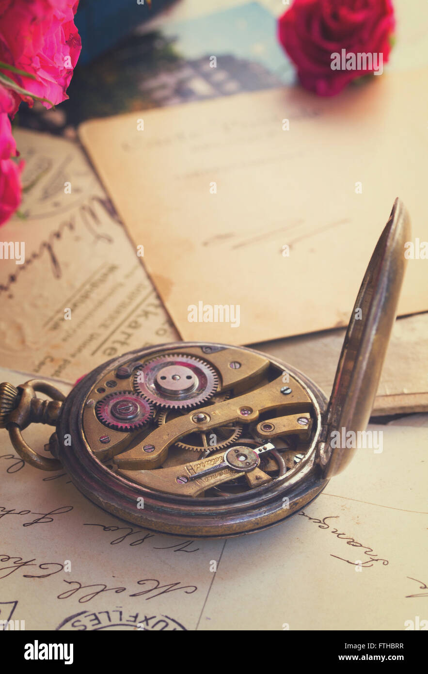retro concept with antique clock Stock Photo - Alamy