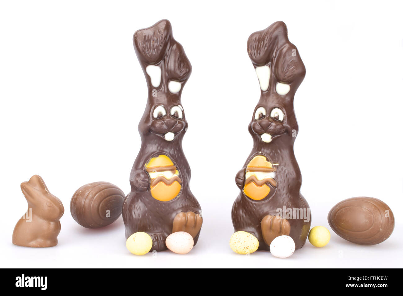 Easter chocolate Bunnies and sweet chocolate eggs on white background ...