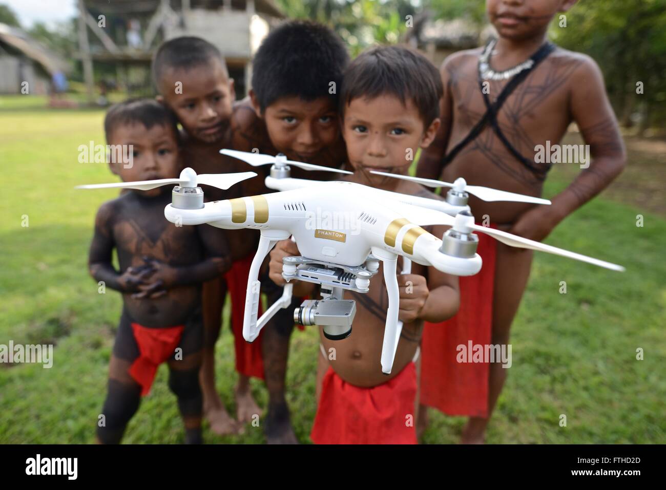 Local community discovering drone technology for the first time ever ...
