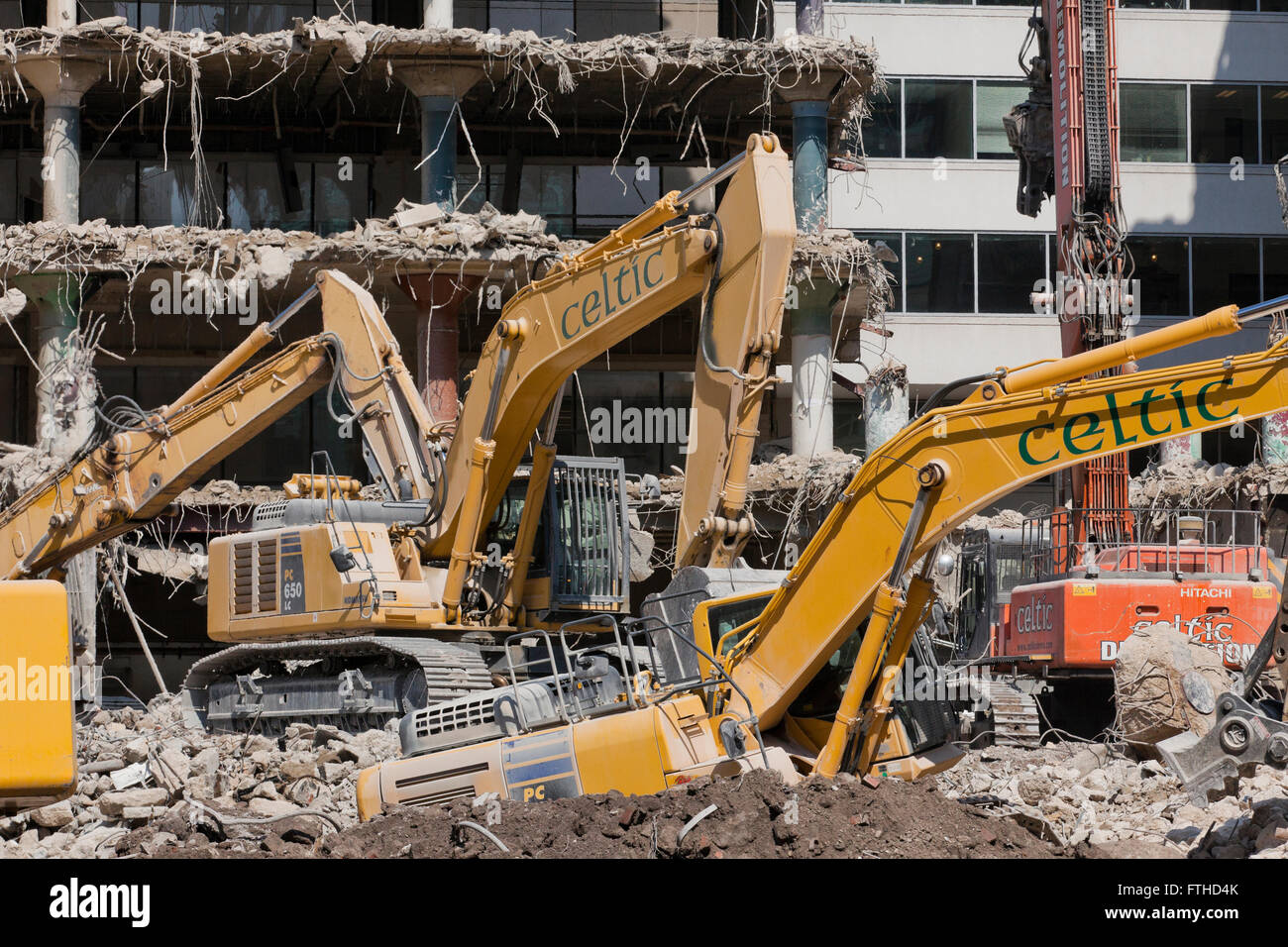 Caterpillar excavator at building demolition site - Washington, DC USA ...