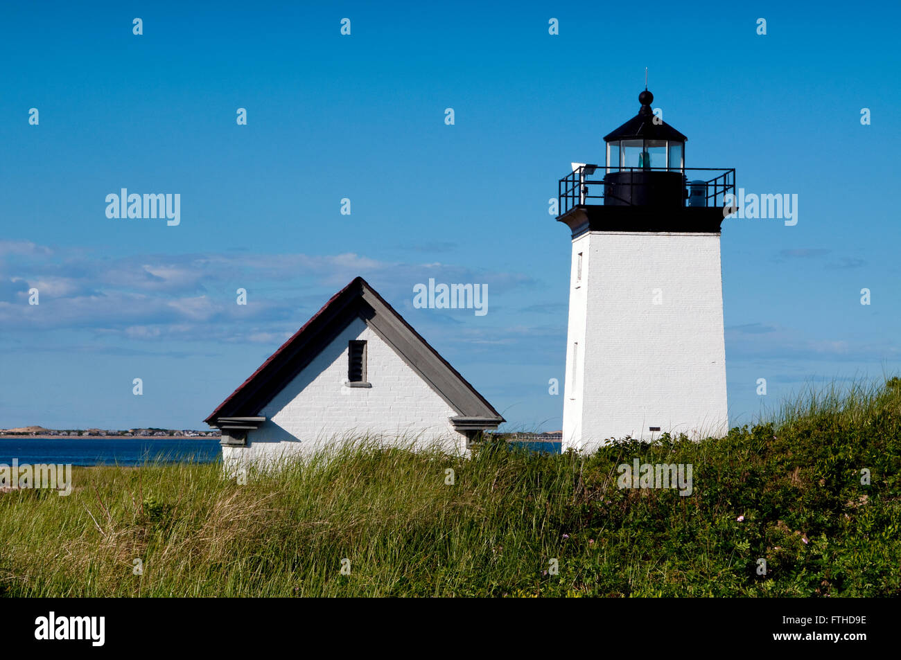 Long Point lighthouse on a warm summer day. It is a favorite three-mile ...