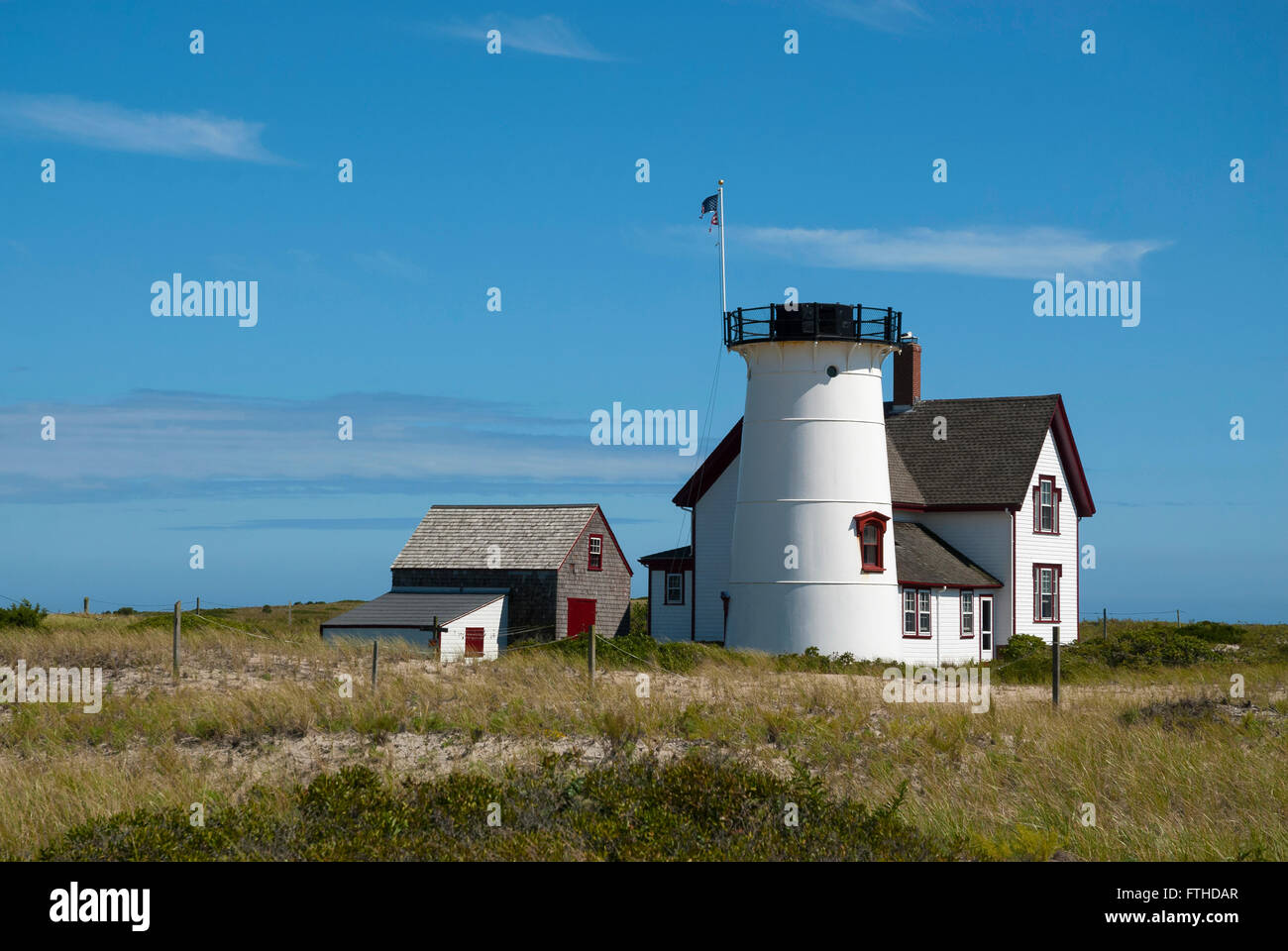 Stage Harbor lighthouse, with its missing tower, is a popular ...