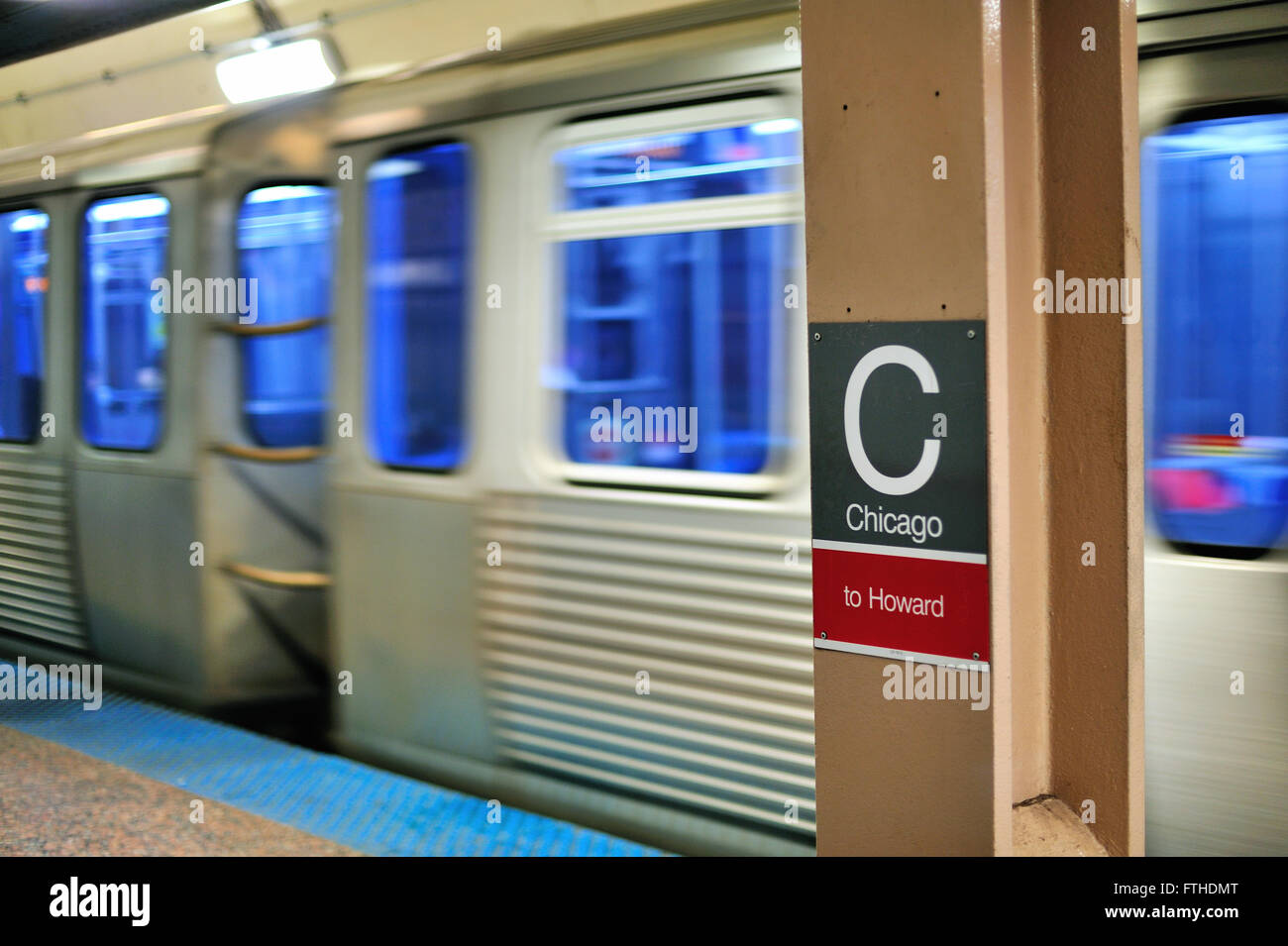 A train rushing into the CTA subway station at Chicago's namesake ...