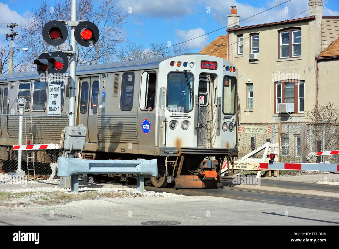 A Pink Line rapid transit train on its way to Chicago's Loop rides ...