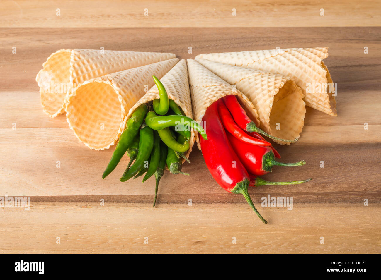 Green in red hi-res stock photography and images - Alamy