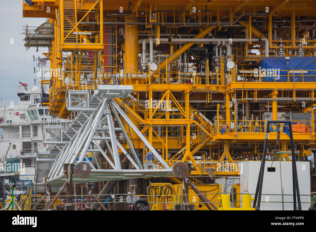 Closeup of an oil rig and its torch Stock Photo - Alamy