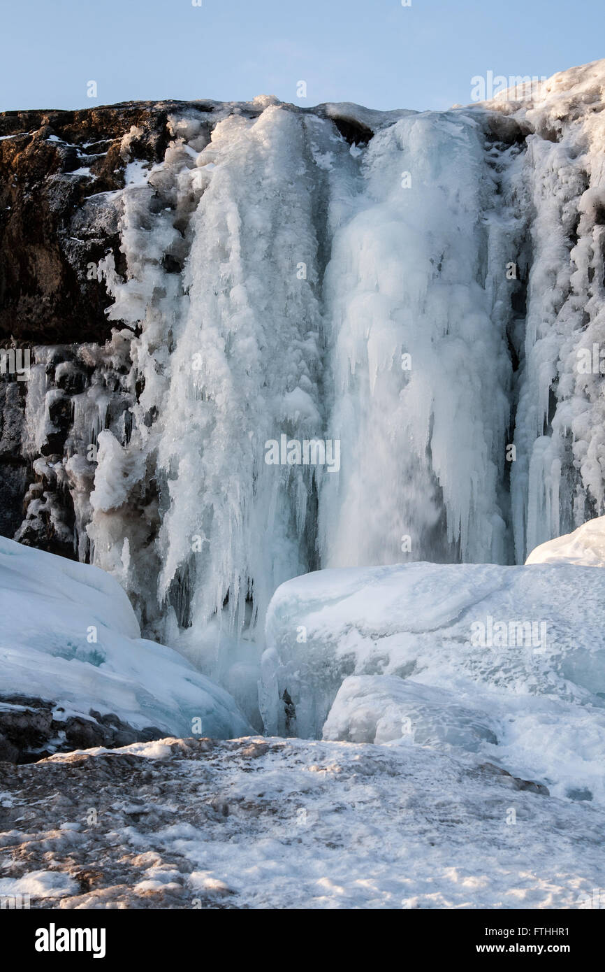 Oxarafoss waterfalls, Thingvellir National Park covered in snow and ice ...