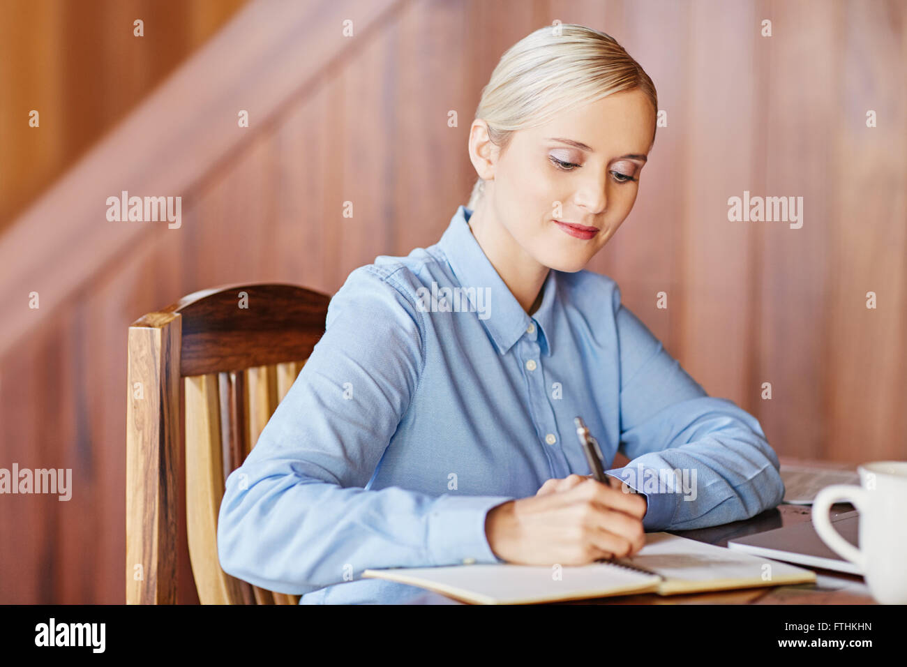 Going through the day's notes Stock Photo - Alamy
