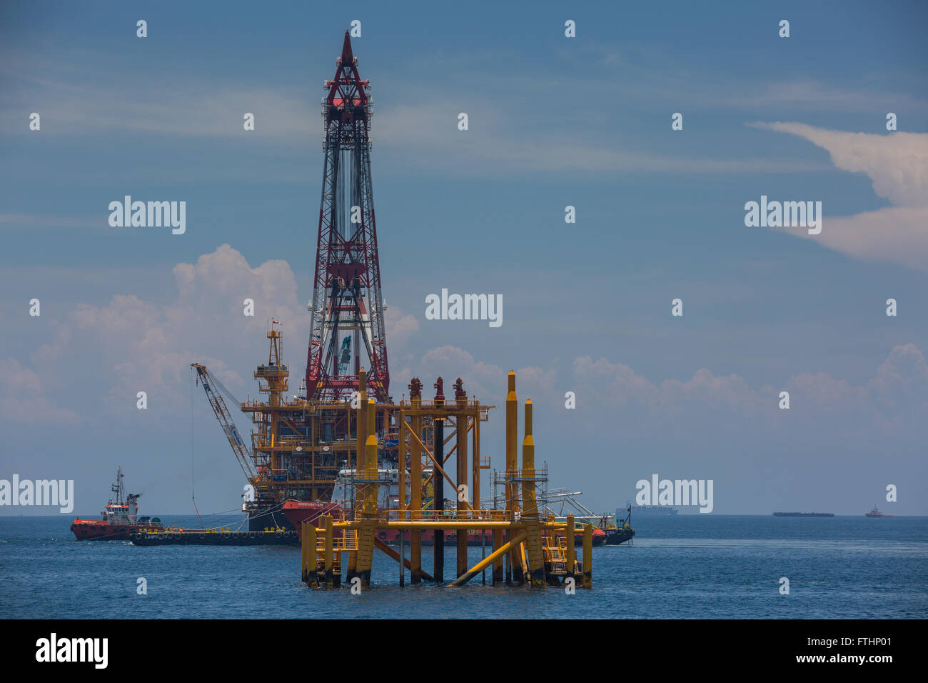 Oil rig lifting for installation on its jacket Stock Photo - Alamy