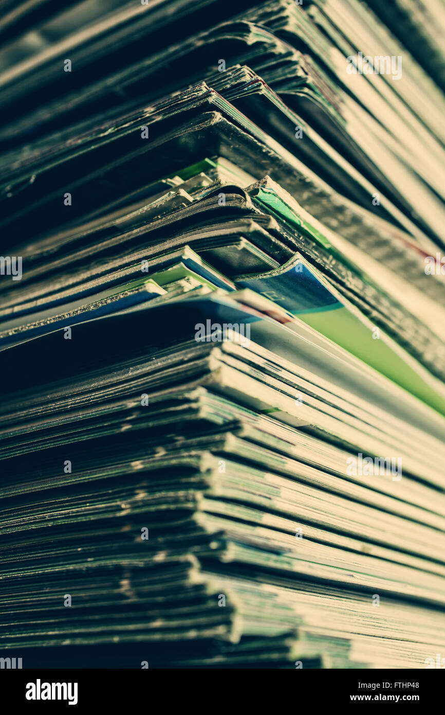 Large stack of magazines on table close-up Stock Photo - Alamy