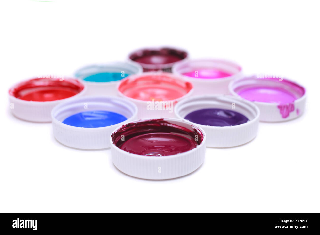 Colorful acrylic paints in covers isolated on table Stock Photo - Alamy