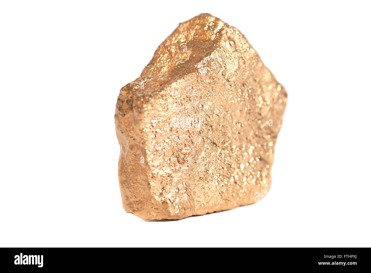 Golden nugget isolated on white background Stock Photo - Alamy