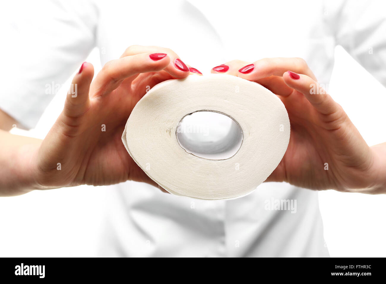 Hands beauticians squeeze roll of toilet paper Stock Photo - Alamy