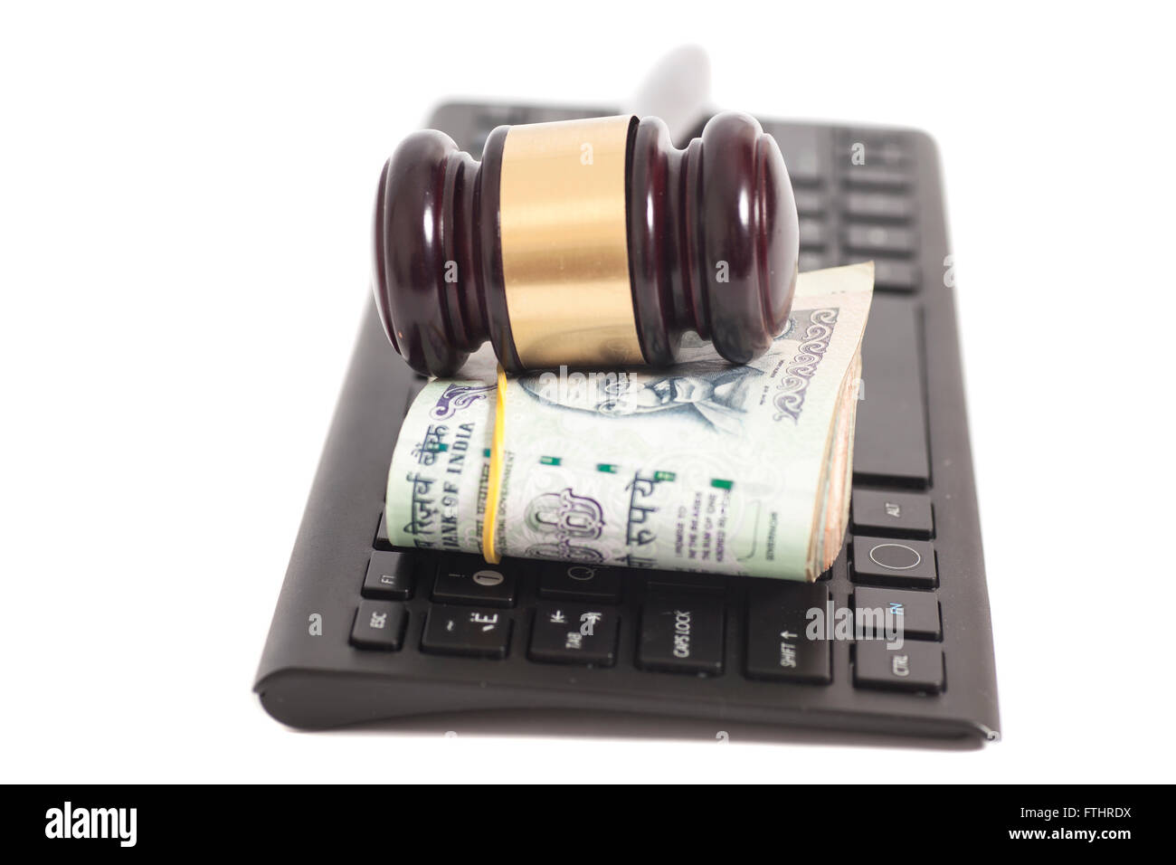 Indian Currency Rupee Notes and Law Gavel on computer keyboard isolated ...
