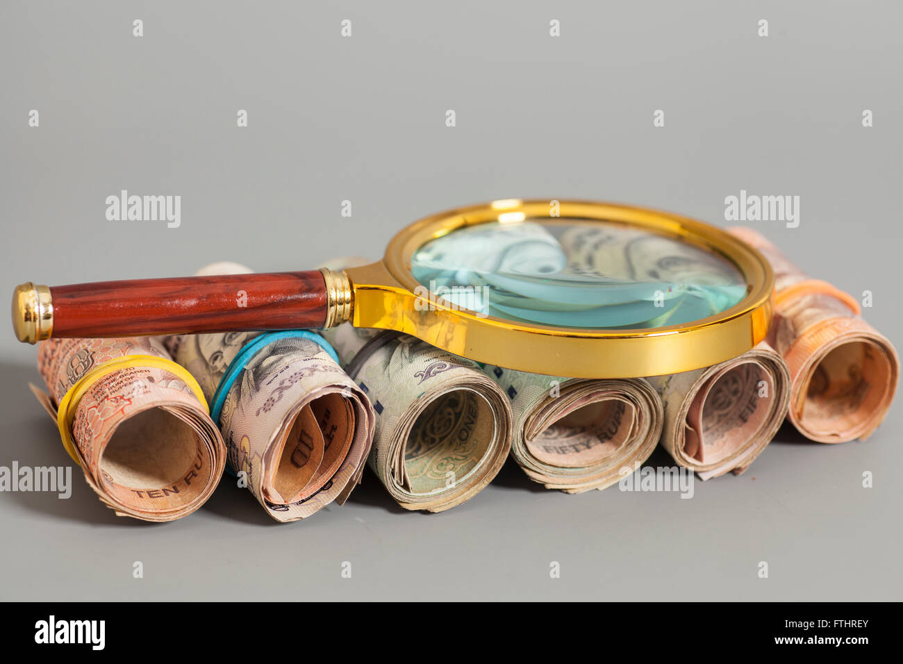 Indian currency roll hi-res stock photography and images - Alamy