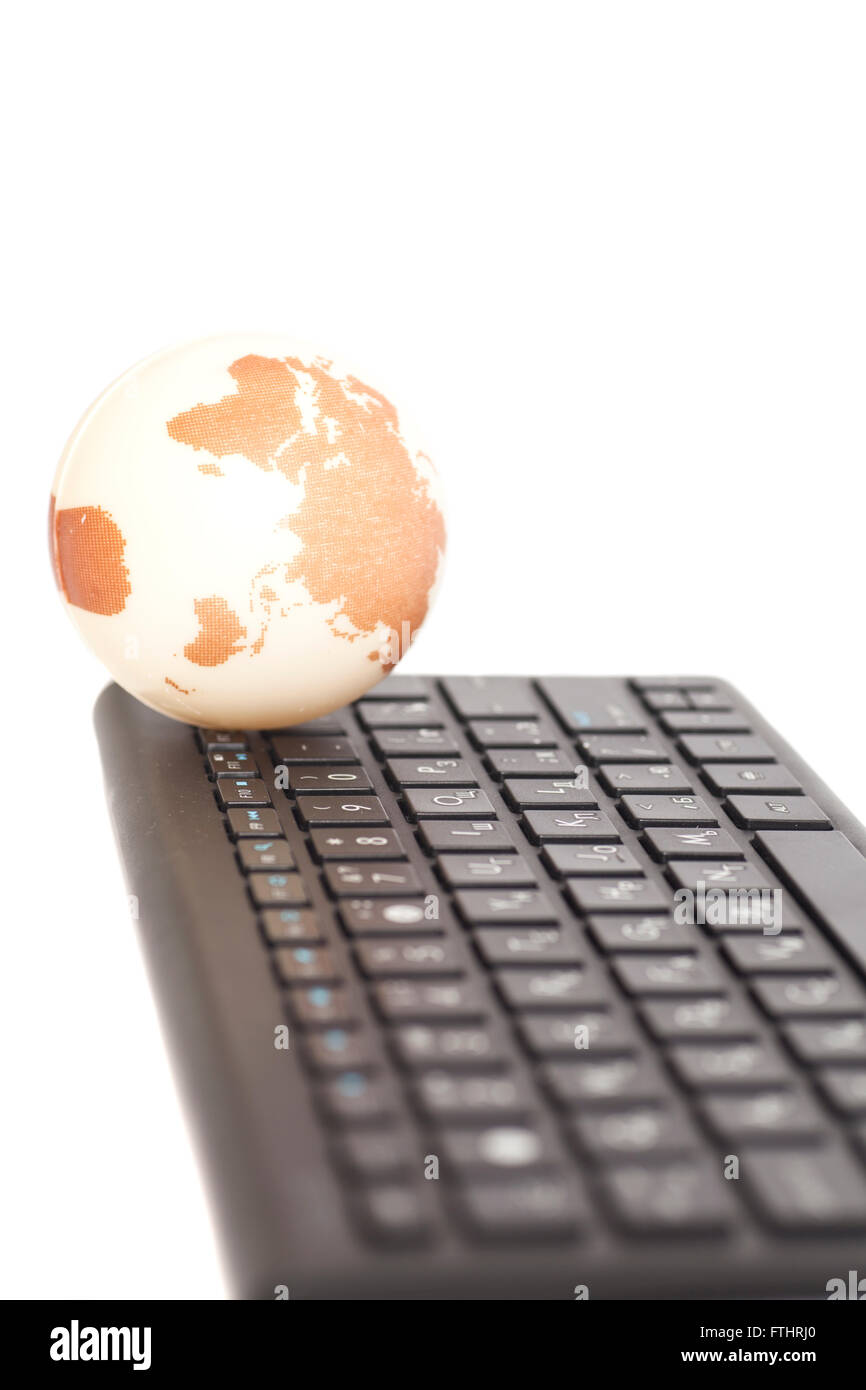 Earth on keyboard isolated on white background Stock Photo - Alamy