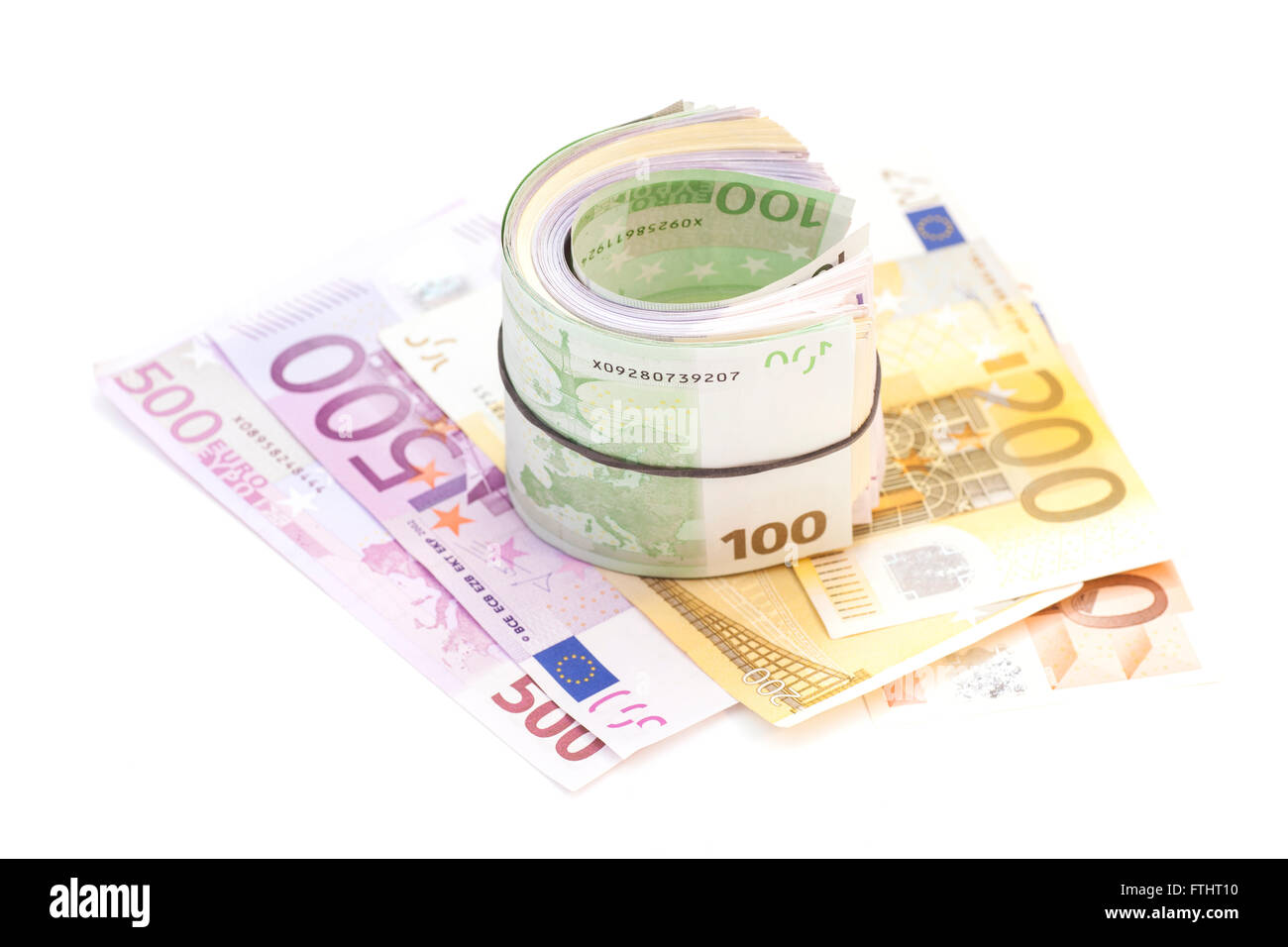 Euro banknotes under rubber band on banknotes isolated Stock Photo - Alamy
