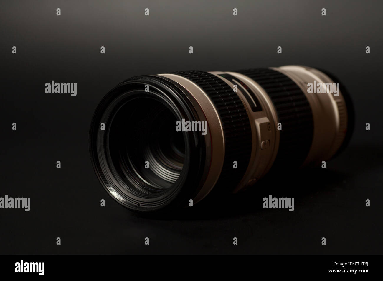Camera photo lens over black background Stock Photo - Alamy