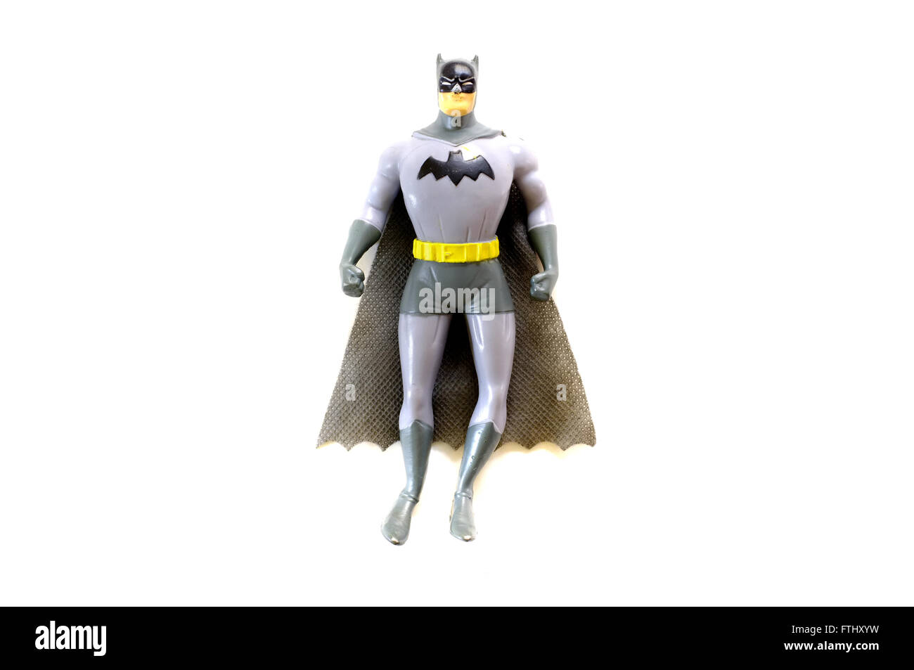 A child's Batman figure toy photographed against a white background ...