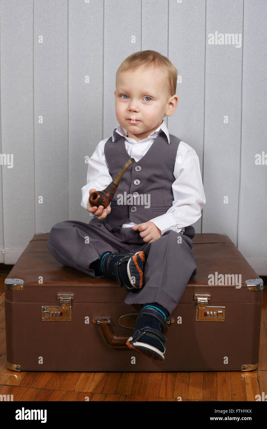 little boy with smoking pipe Stock Photo - Alamy