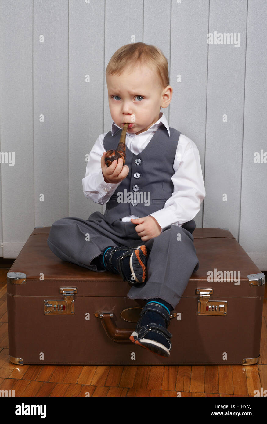 little boy with smoking pipe Stock Photo - Alamy