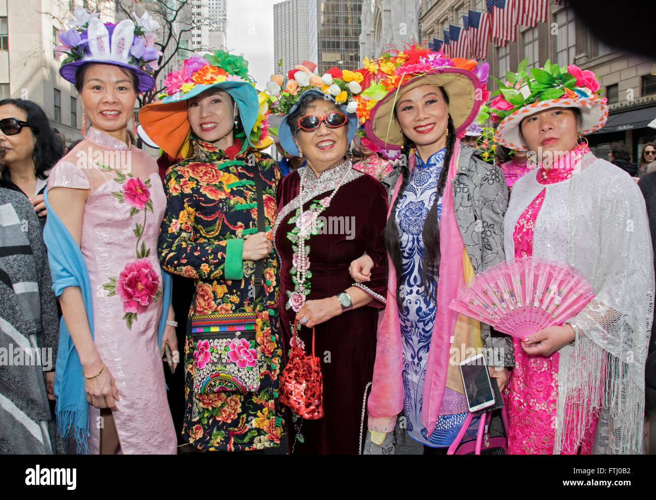 Five attractive Chinese women in ornate hats on Fifth Avenue in ...