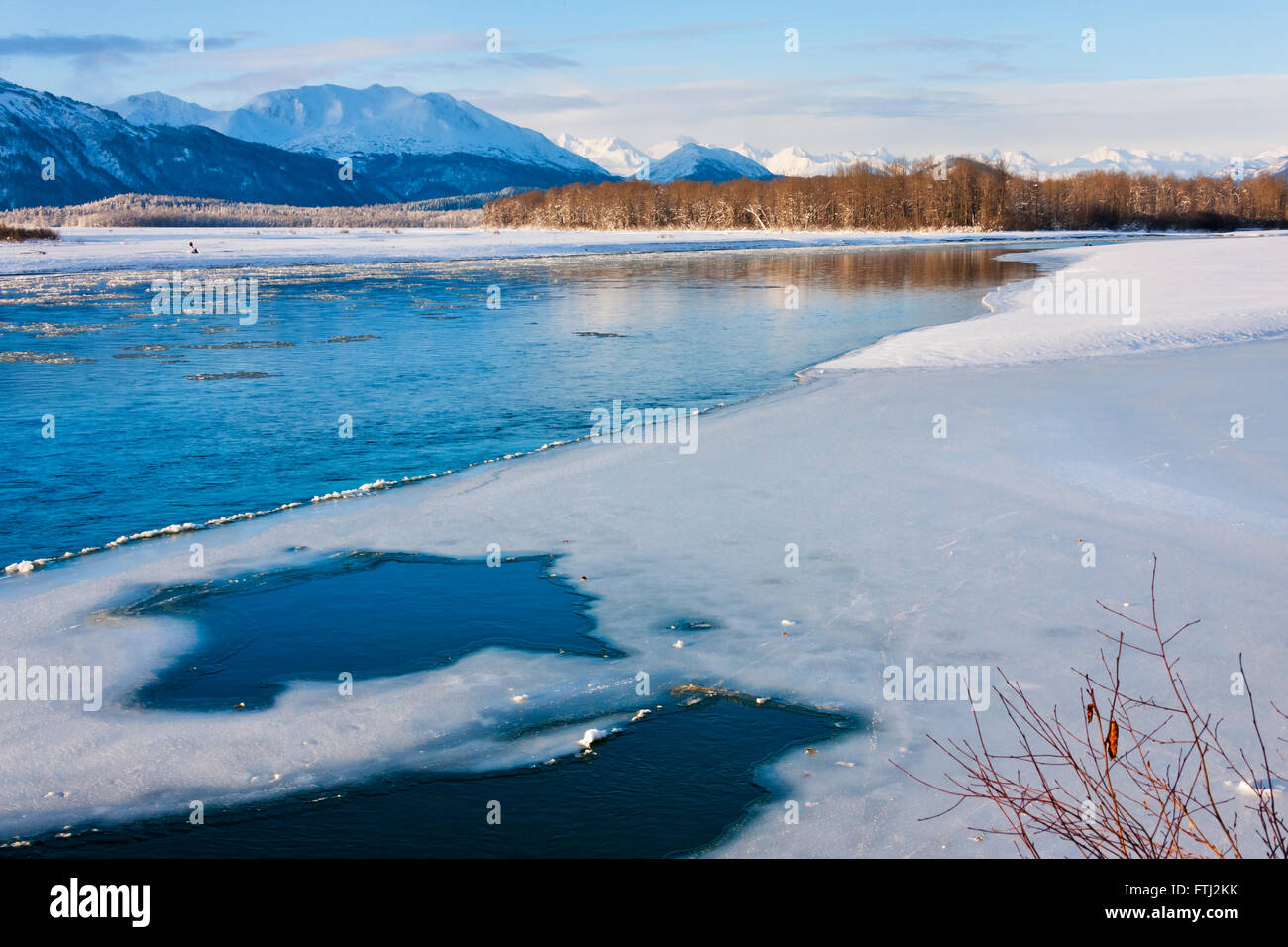 River and mountain covered with snow, Haines, Alaska, USA Stock Photo ...