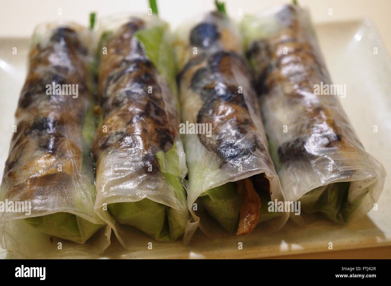 Vegetarian Vietnamese summer rolls with translucent rice paper, salad ...