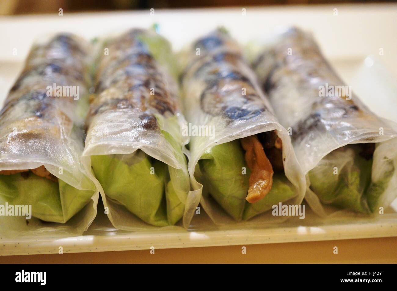 Vegetarian Vietnamese summer rolls with translucent rice paper, salad ...