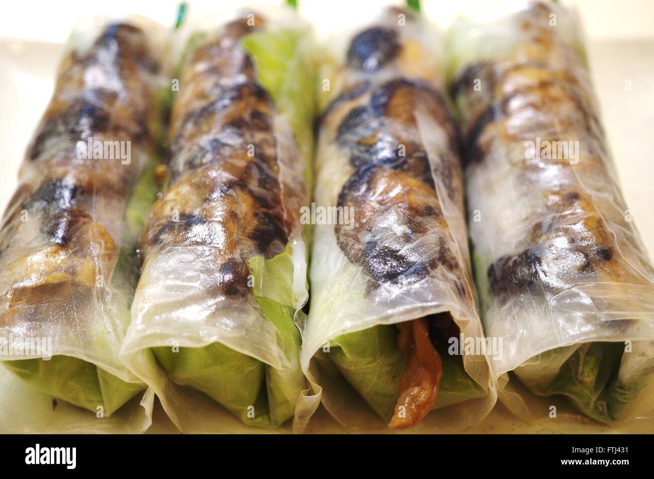 Vegetarian Vietnamese summer rolls with translucent rice paper, salad ...