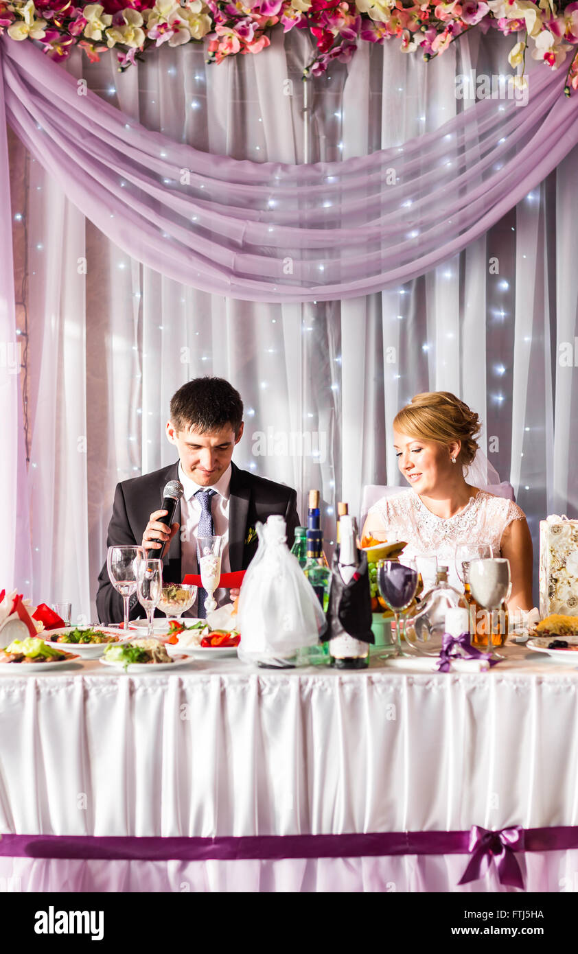 Bride And Groom Celebrating At Reception Stock Photo - Alamy