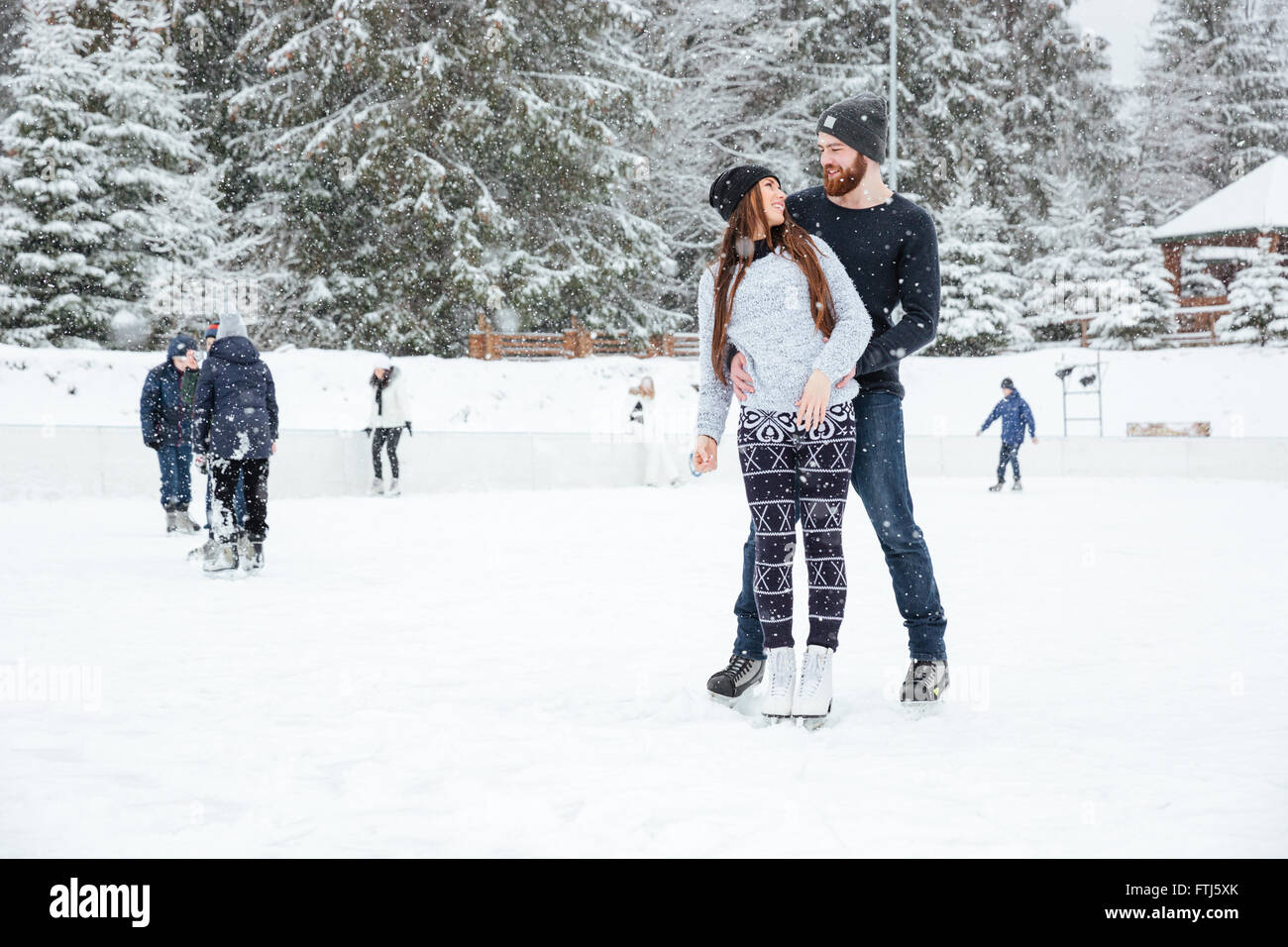 Couple ice skating hi-res stock photography and images - Alamy