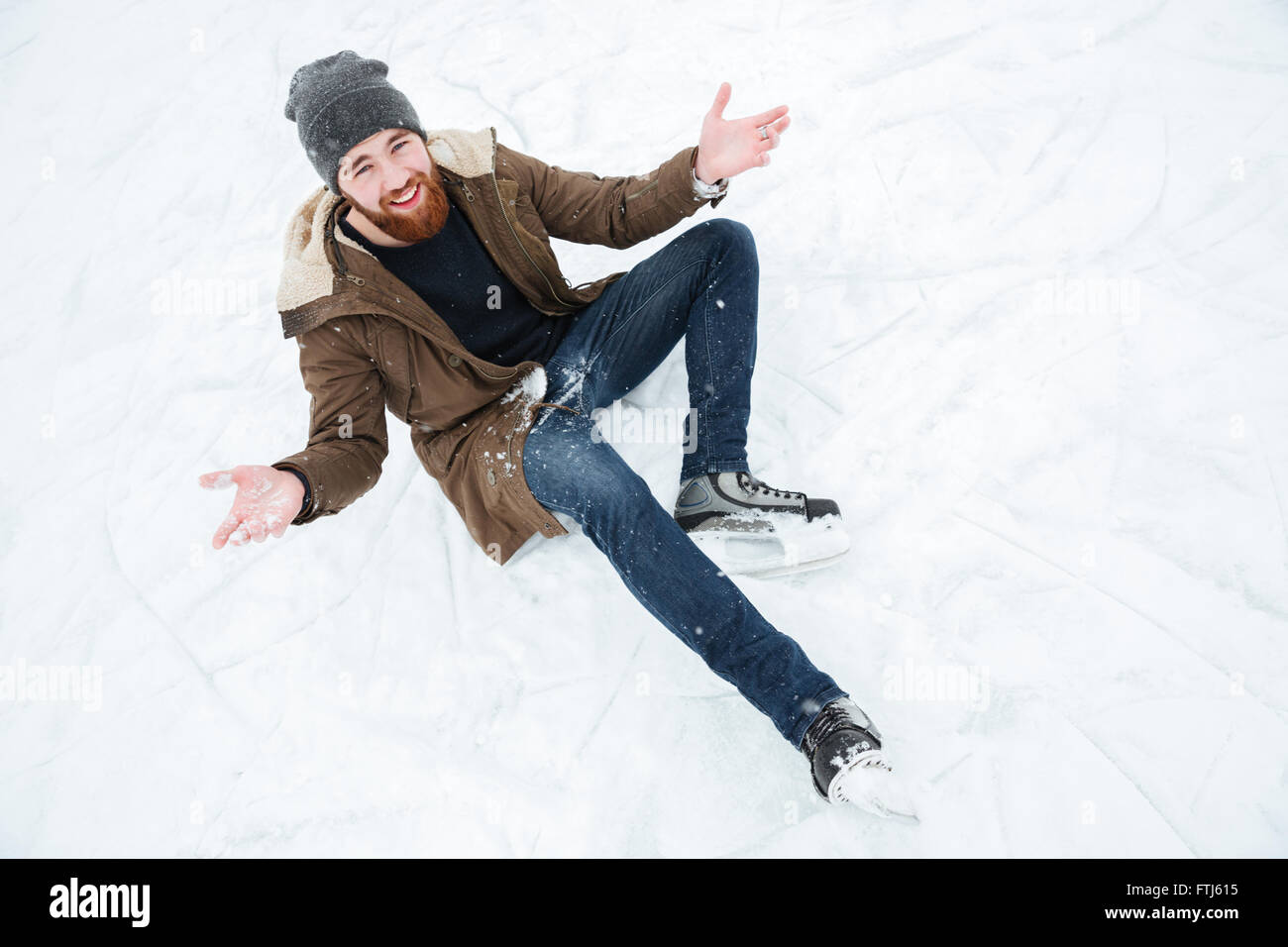 Man sitting on ice hi-res stock photography and images - Alamy