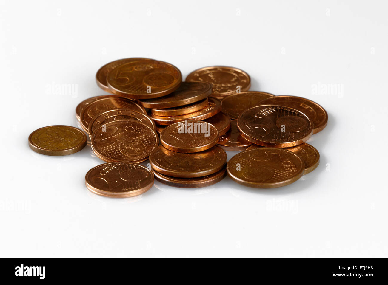 European copper coins on white background Stock Photo - Alamy