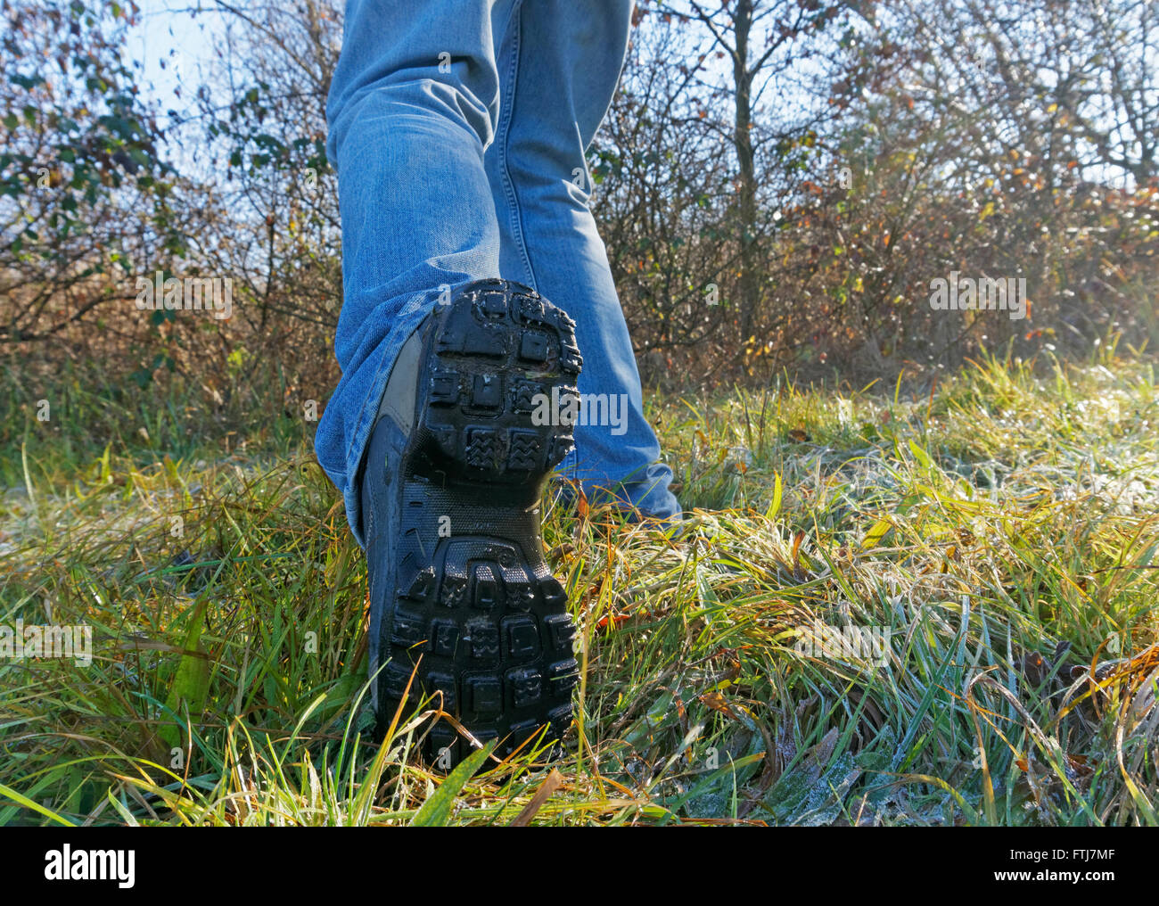 Person walking field grass hi-res stock photography and images - Alamy