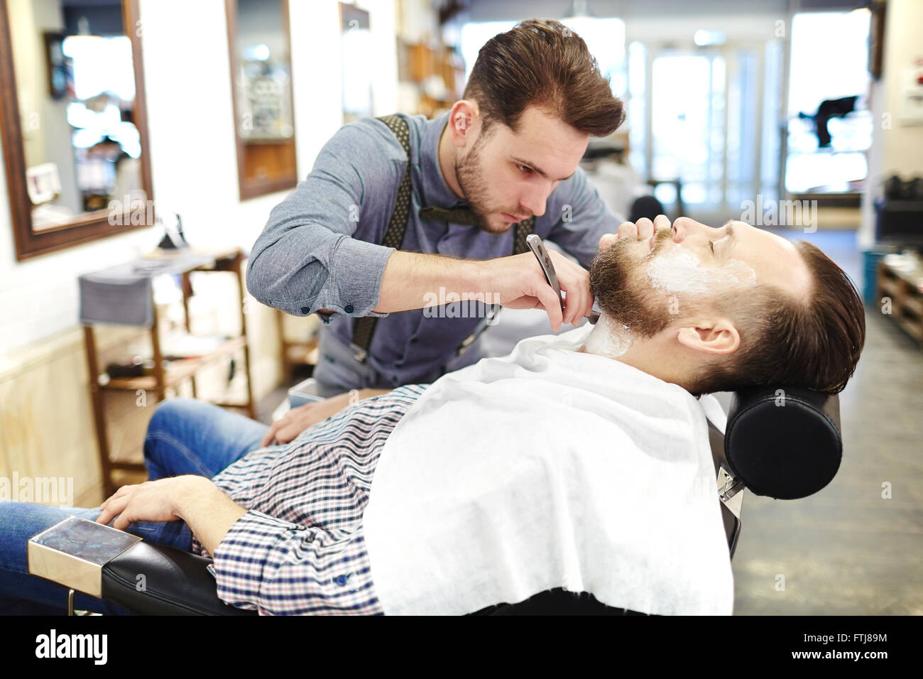 Barber bearded man barbershop hi-res stock photography and images - Alamy