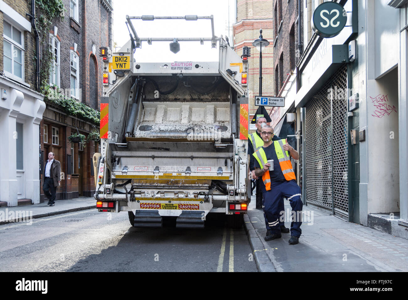 Bin men hi-res stock photography and images - Alamy