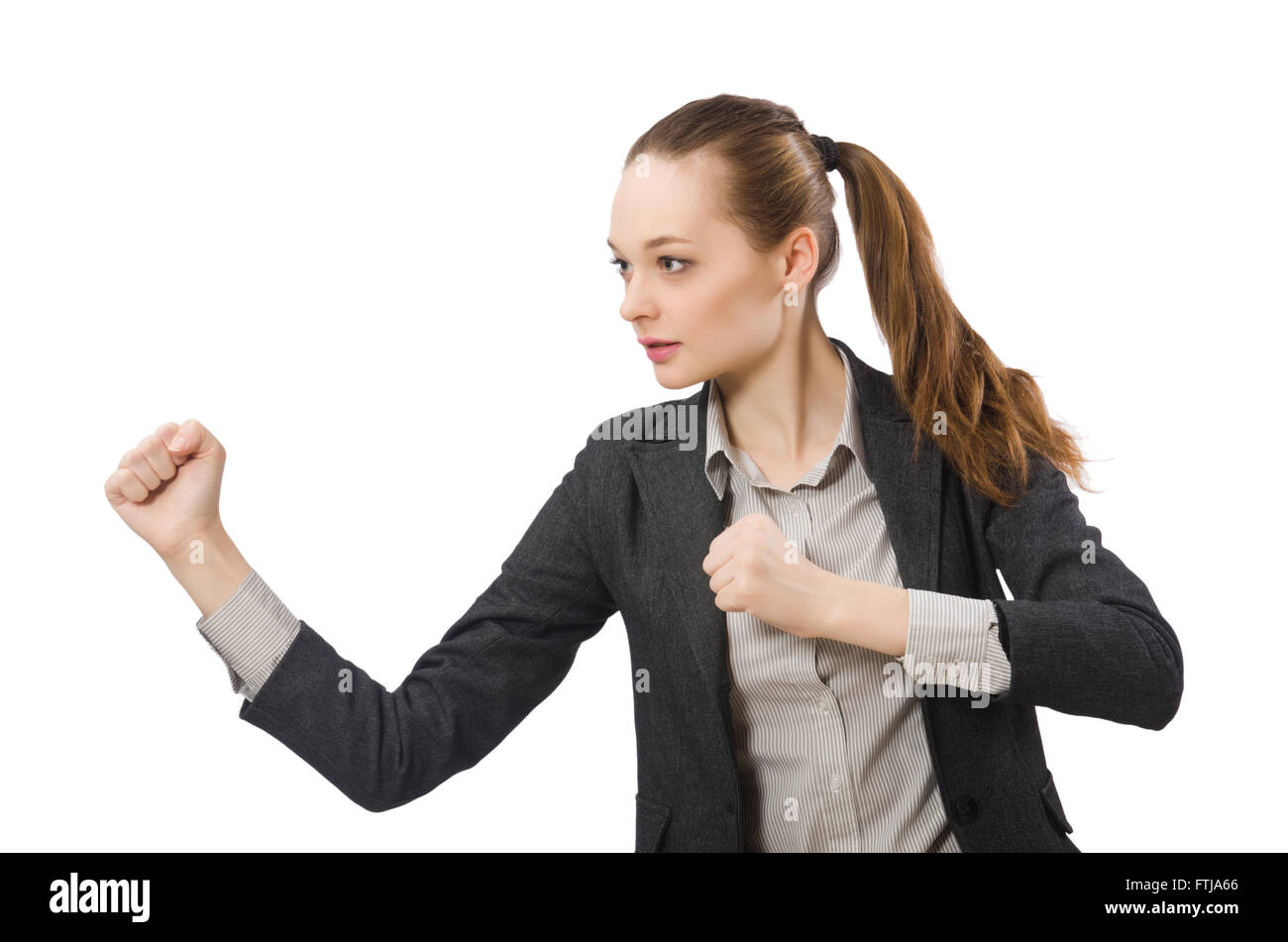 Pretty office manager fighting isolated on white Stock Photo - Alamy
