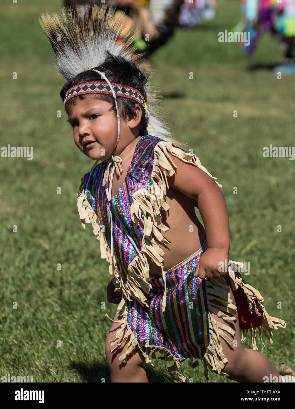 Native american dancer child beads hi-res stock photography and images ...