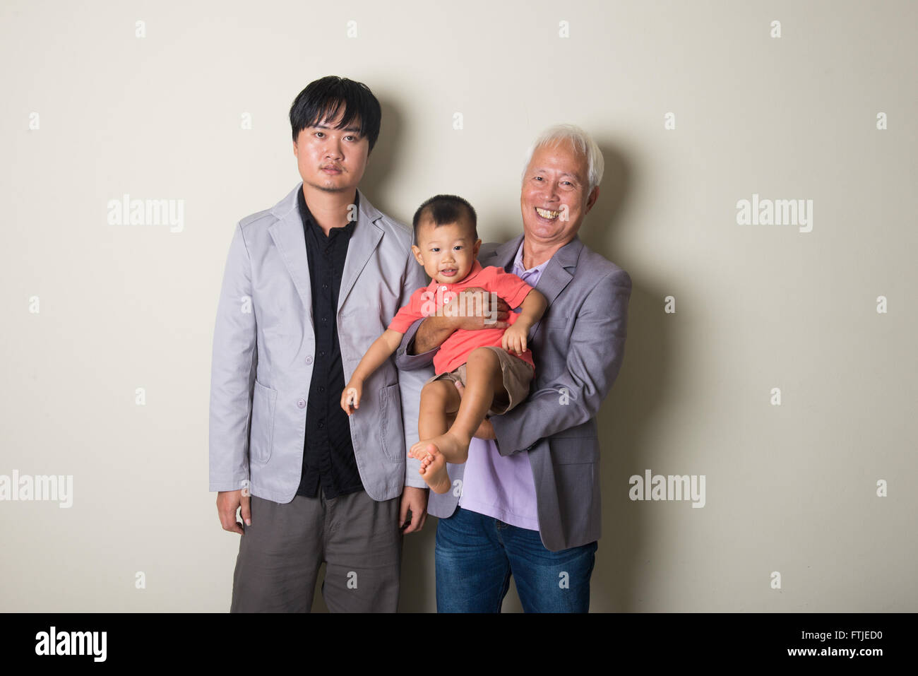 Loving three generation male hi-res stock photography and images - Alamy