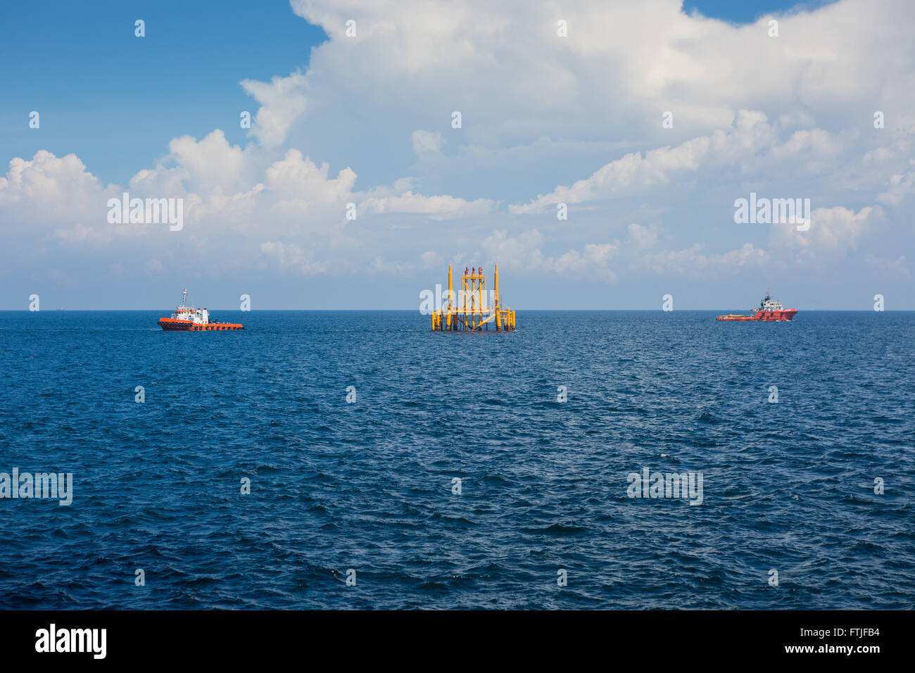 Oil jacket in the sea Stock Photo - Alamy