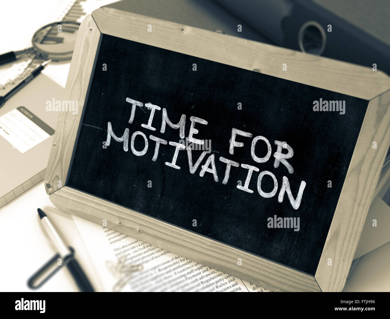 Hand Drawn Time for Motivation Concept on Chalkboard. Blurred ...