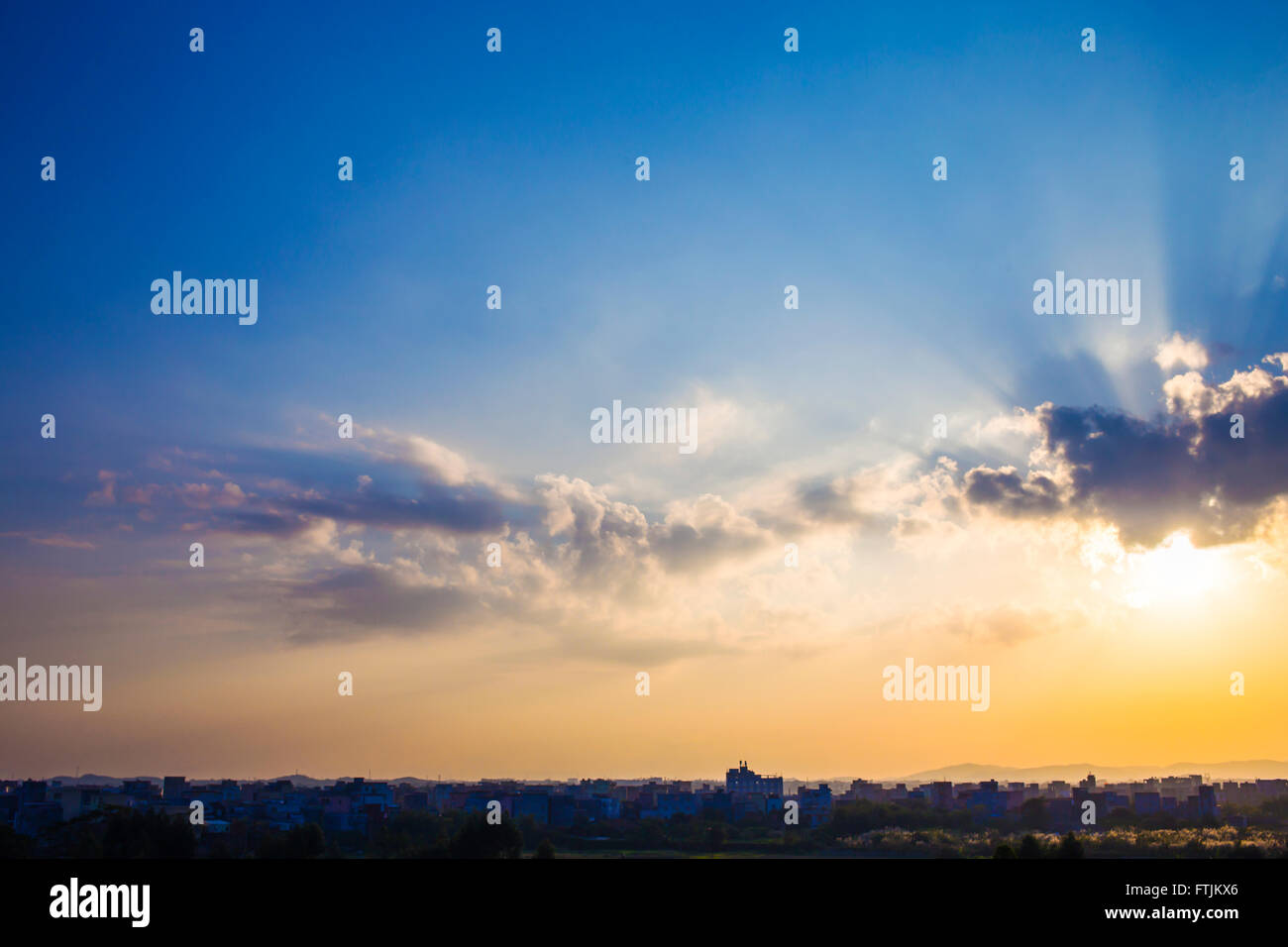 Town at dusk sunset is very beautiful Stock Photo - Alamy