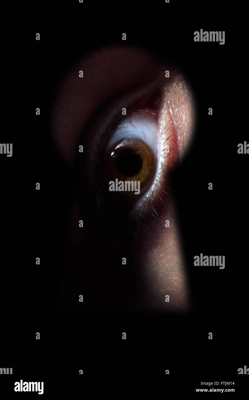 Eyes peeking through the door hi-res stock photography and images - Alamy