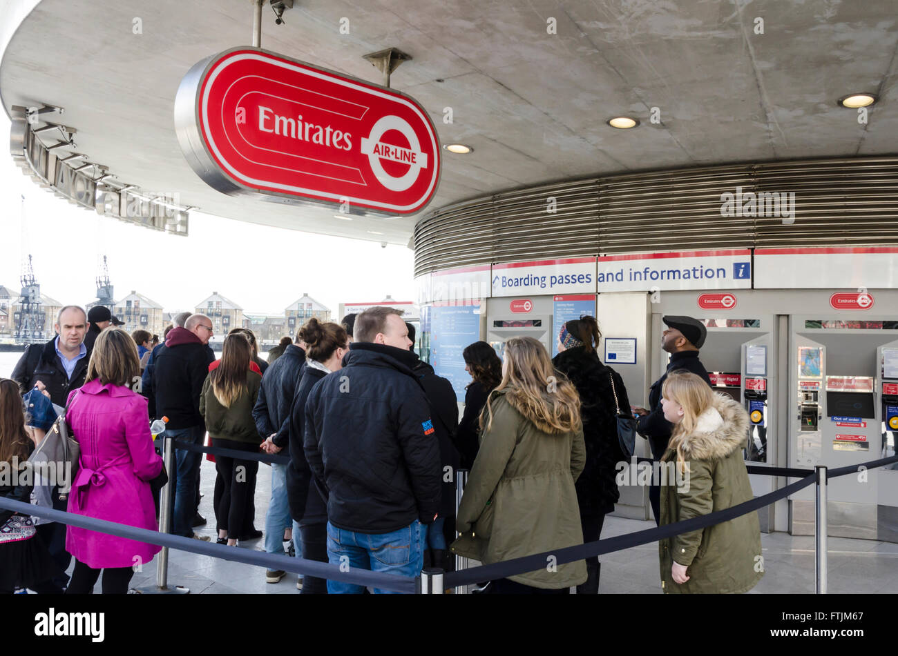 People queue travel on the Emirates Air Line which is a cable car ...